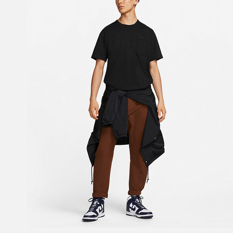 NIKE men's nike solid color pocket round neck loose short sleeve black t-shirt